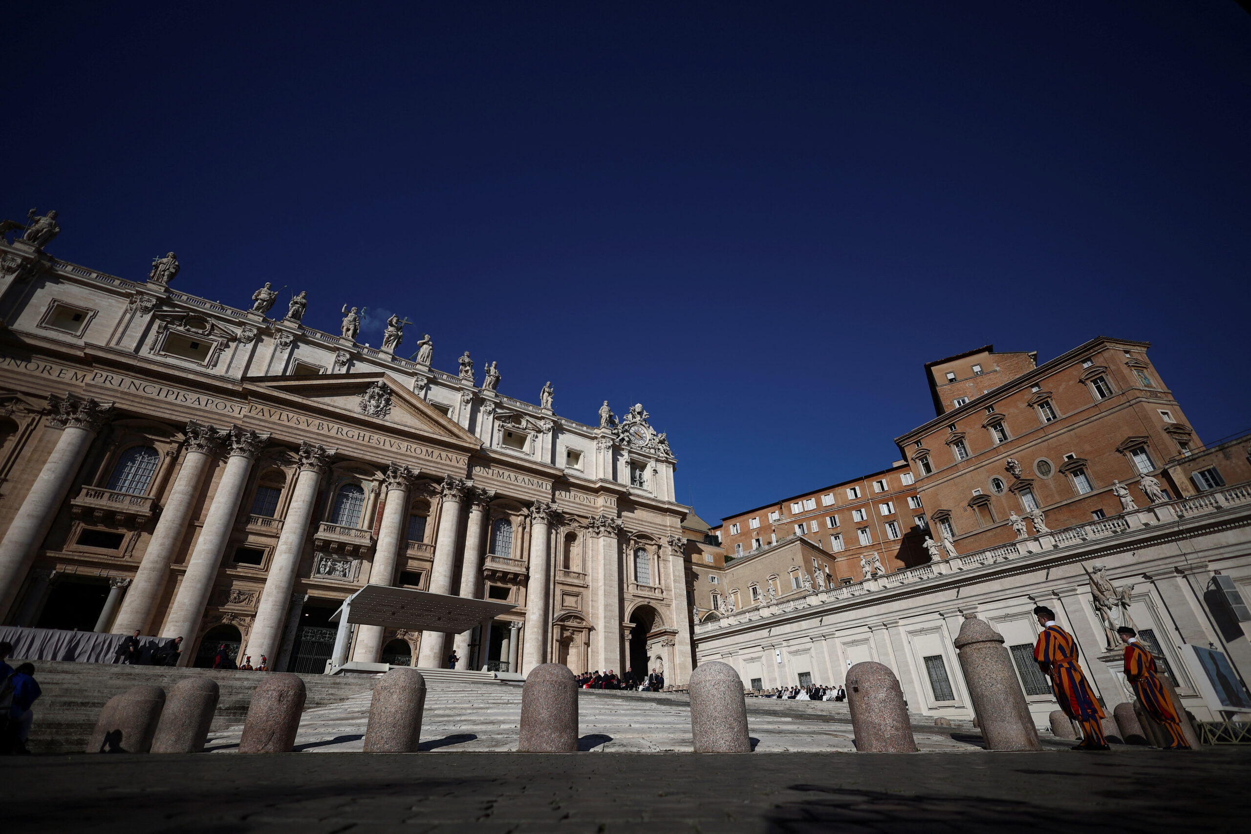 Transgender people can be baptized Catholic, serve as godparents ...